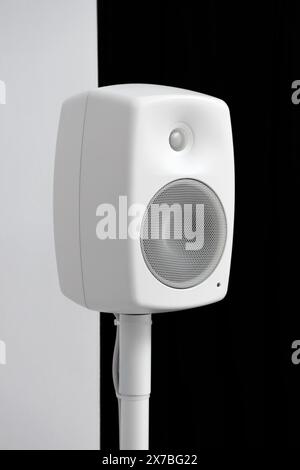 White sound speaker on a leg, close-up Stock Photo - Alamy