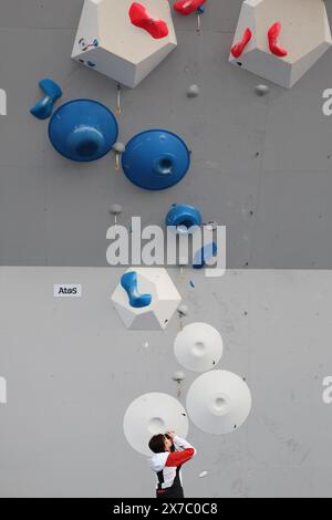 Shanghai. 19th May, 2024. Luo Zhilu of China checks the route during ...