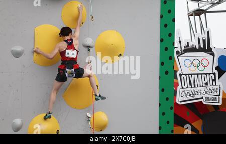 Shanghai. 19th May, 2024. Luo Zhilu of China checks the route during ...