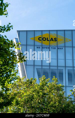 Sign and logo on the Colas headquarters building. Colas is a French ...