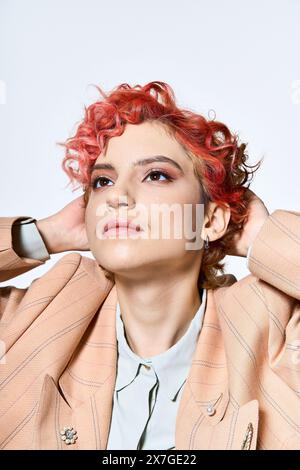 Extraordinary woman with red hair strikes a pose for a portrait Stock ...