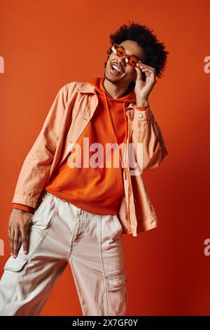 emotional guy with curly hair in headphones listening to music fun ...