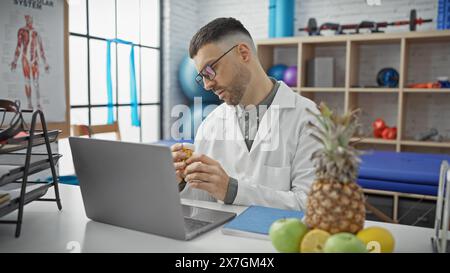 Hispanic man with beard working at therapy office holding call me sign ...