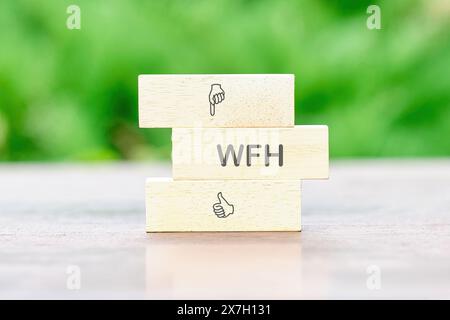 WFH text written on green lines stamp sign Stock Photo - Alamy