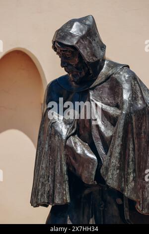 Statue of Prince Francois Grimaldi disguised as a monk Stock Photo - Alamy