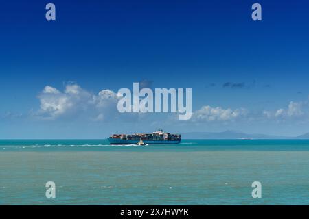 Container ship arriving at Tanger Med port being greeted and guided by ...