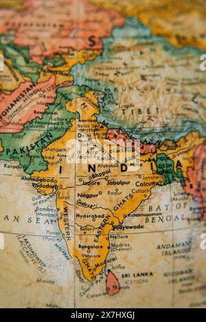 A detailed vintage globe map highlighting the geography of India ...