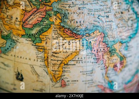 A detailed vintage globe highlighting the geography of India, Pakistan ...