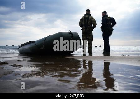 A beach landing by the Royal Marines of 47 Commando at Asnelles before ...