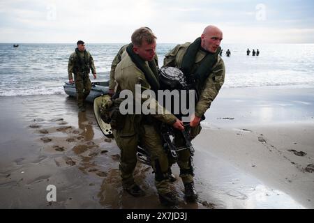 A beach landing by the Royal Marines of 47 Commando at Asnelles before ...