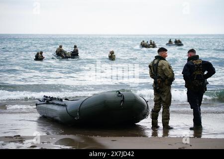 A beach landing by the Royal Marines of 47 Commando at Asnelles before ...