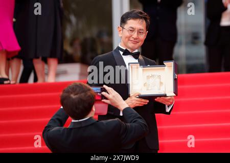 Goro Miyazaki and Kenichi Yoda pose with the Golden Palm for Studio ...