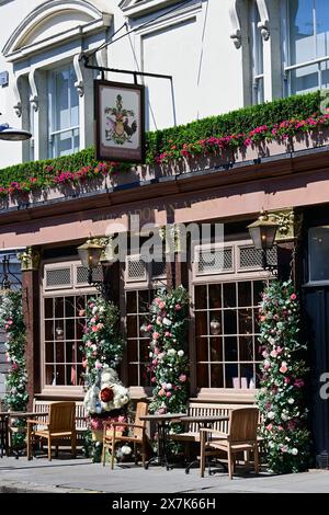 Kings Arms - classic British pub with crest on door sandwich board sign ...