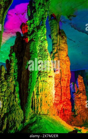 The Silver Cave, natural limestone cave with multicolored lighting in ...