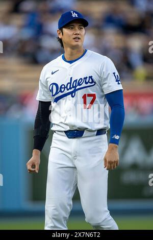 Los Angeles Dodgers' Shohei Ohtani laughs with his strength and ...