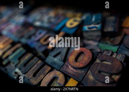 The movable wooden letterpress types are seen stored in a tray at an ...