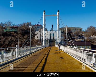Orenburg, Russia- March 29, 2024 The pedestrians bridge over the Ural ...