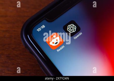 Reddit and OpenAI icons. OpenAI and Reddit announced a partnership to ...