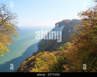 White cliffs and autumnal wooded slopes on the blue coast, Binz, Ruegen ...