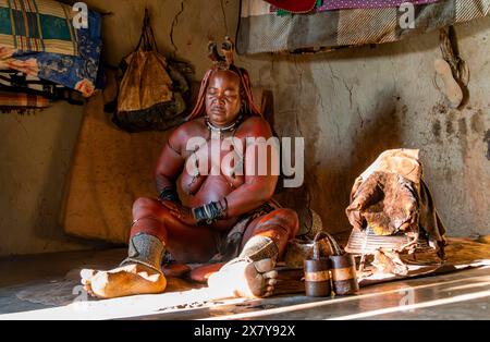 Interior of a first woman's mud hut in a Himba village, traditional ...
