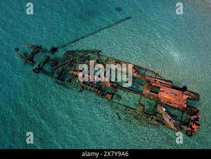 Greece, People dive into the crystal clear waters of the Mediterranean ...