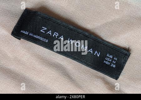 Zara Woman label in woman's top clothing garment made in Morocco Stock ...