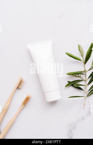 top view of bamboo brown toothbrushes on white background Stock Photo ...