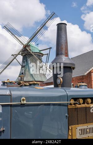 old tractors at an old wind mill in germany Stock Photo - Alamy