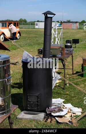 Cooking food on a military field kitchen in field conditions Stock ...