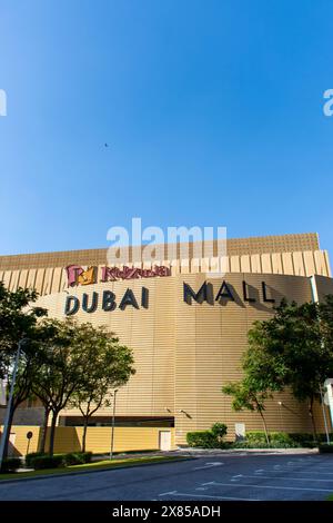 Dubai Mall Signboard name on the wall. Fountain views. Famous shopping ...