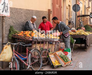 Taroudant, Morocco - 21 March, 2024: shopkeeper selling dates and figs ...