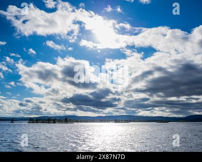 Finland, Lapland, dramatic clouds over lake Stock Photo - Alamy