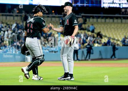 Arizona Diamondbacks pitcher Bryce Jarvis, right, celebrates a win ...