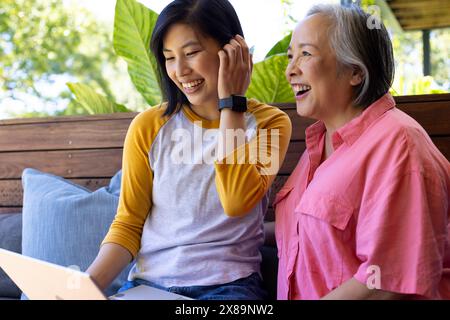 happy middle-aged mother with little baby daughter Stock Photo - Alamy