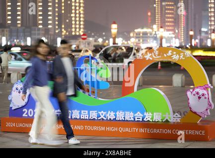 Dalian, China's Liaoning Province. 23rd May, 2024. Tourists enjoy a ...