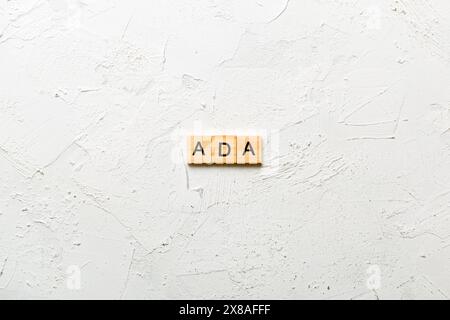 ADA word written on wood block. ADA text on table, concept Stock Photo ...