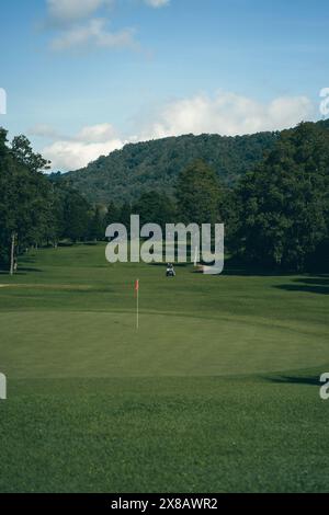 Golf course. People play golf. Bali, Bedugul Stock Photo - Alamy