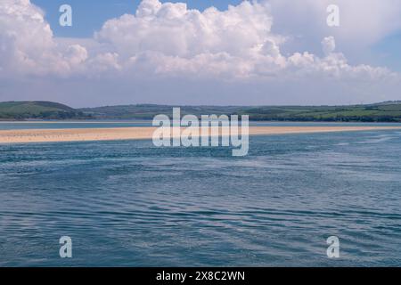 The yellow sand bar known as the Doombar in the river Camel at Padstow ...