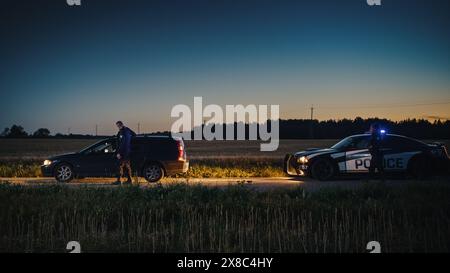 Police officer arresting female driver Stock Photo - Alamy