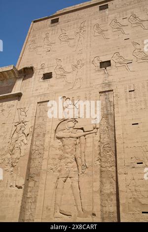 Relief Depicting Horus (right), Pylon, Temple of Horus, Edfu, Egypt ...