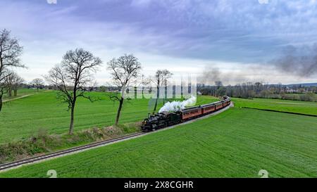 Vintage steam train chugging through the Carpathians Mountains in ...