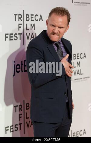 Director/writer/producer Morgan Spurlock walks the red carpet at the ...