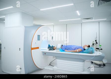Patient prepared for MRI of lower extremity joint Stock Photo - Alamy