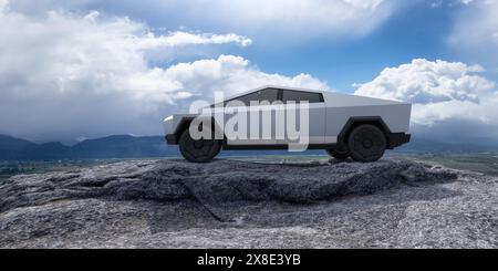Tesla Cybertruck on a Rocky Mountain Top. Aerial landscape in ...