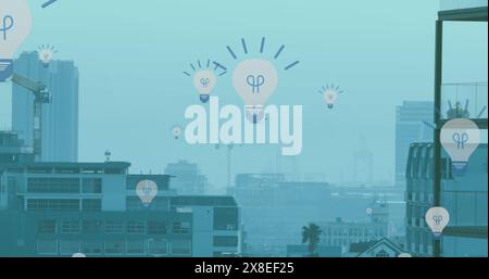 Image of multiple electric bulb icons floating against aerial view of ...