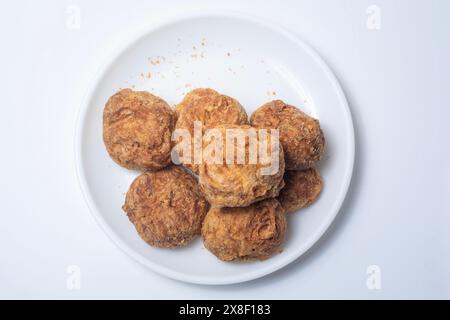 Indian famous tea snacks ooty varkey pastry on white plate on a white ...