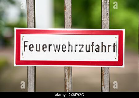 Augsburg, Bavaria, Germany - 23 May 2024: Sign on a fence: Fire brigade ...