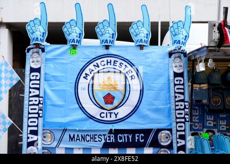 Manchester City merchandise for sale ahead of a parade in Manchester to ...