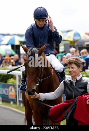Henri Matisse ridden by jockey Ryan Moore on their way to winning the ...