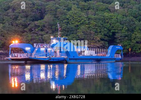 The King Harry chain ferry on a dusk crossing of the River Fal at the ...